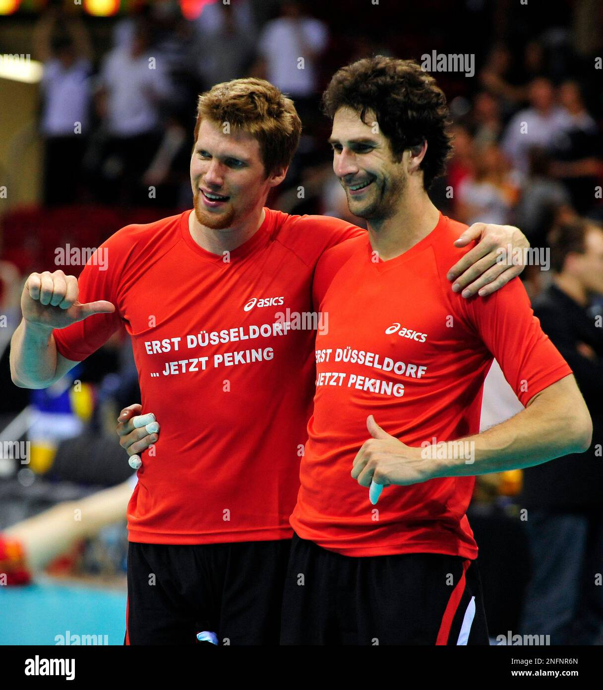 Stefan Huebner and Ralph Bergmann of Germany celebrate after winning ...
