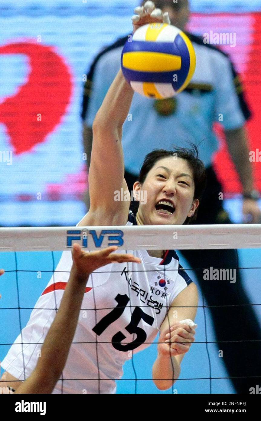 South Korea's Kim Se-young spikes the ball against Dominican Republic ...
