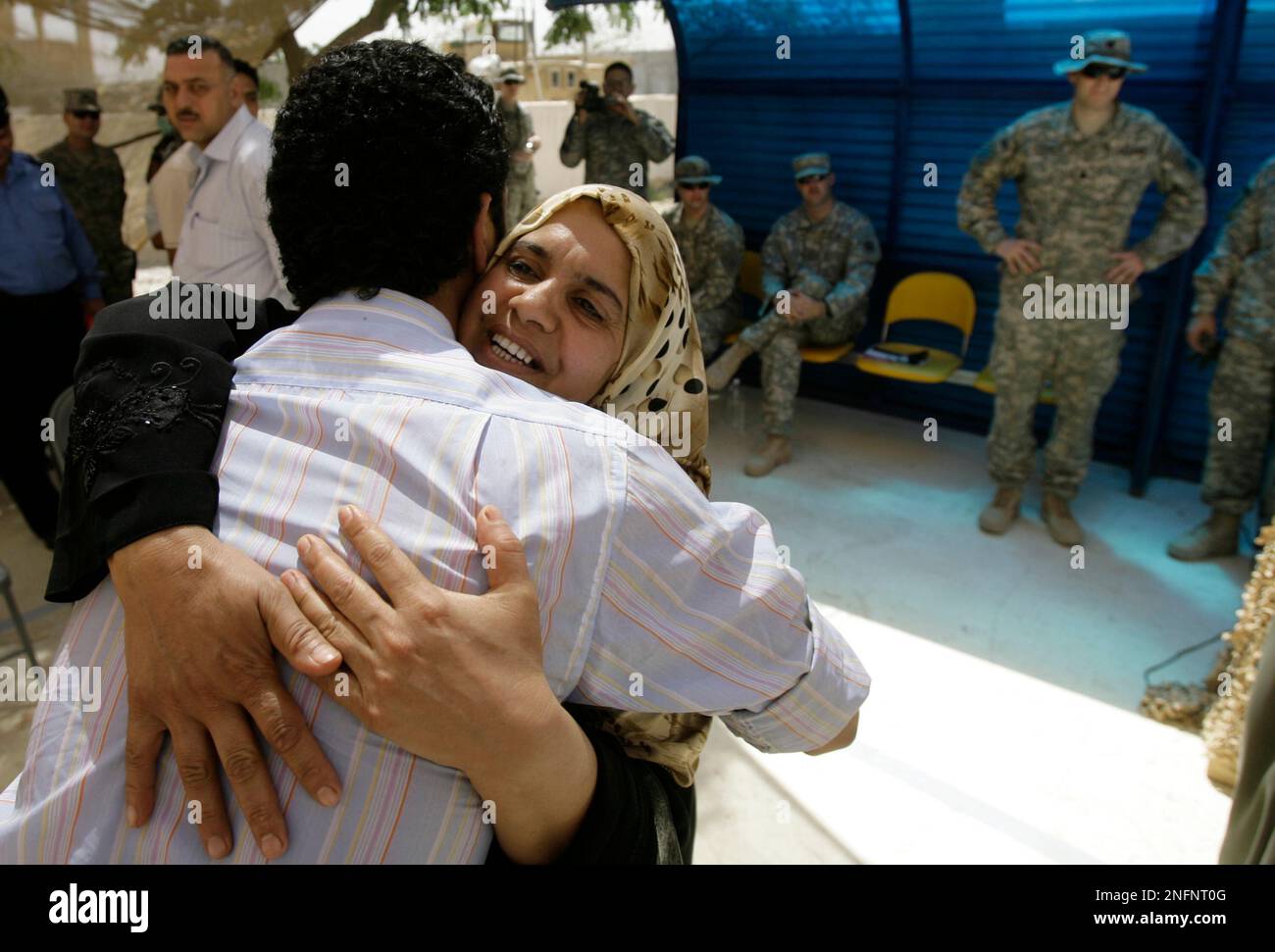 Mother of Mahmood Shaker embraces her son after Mahmood was released ...