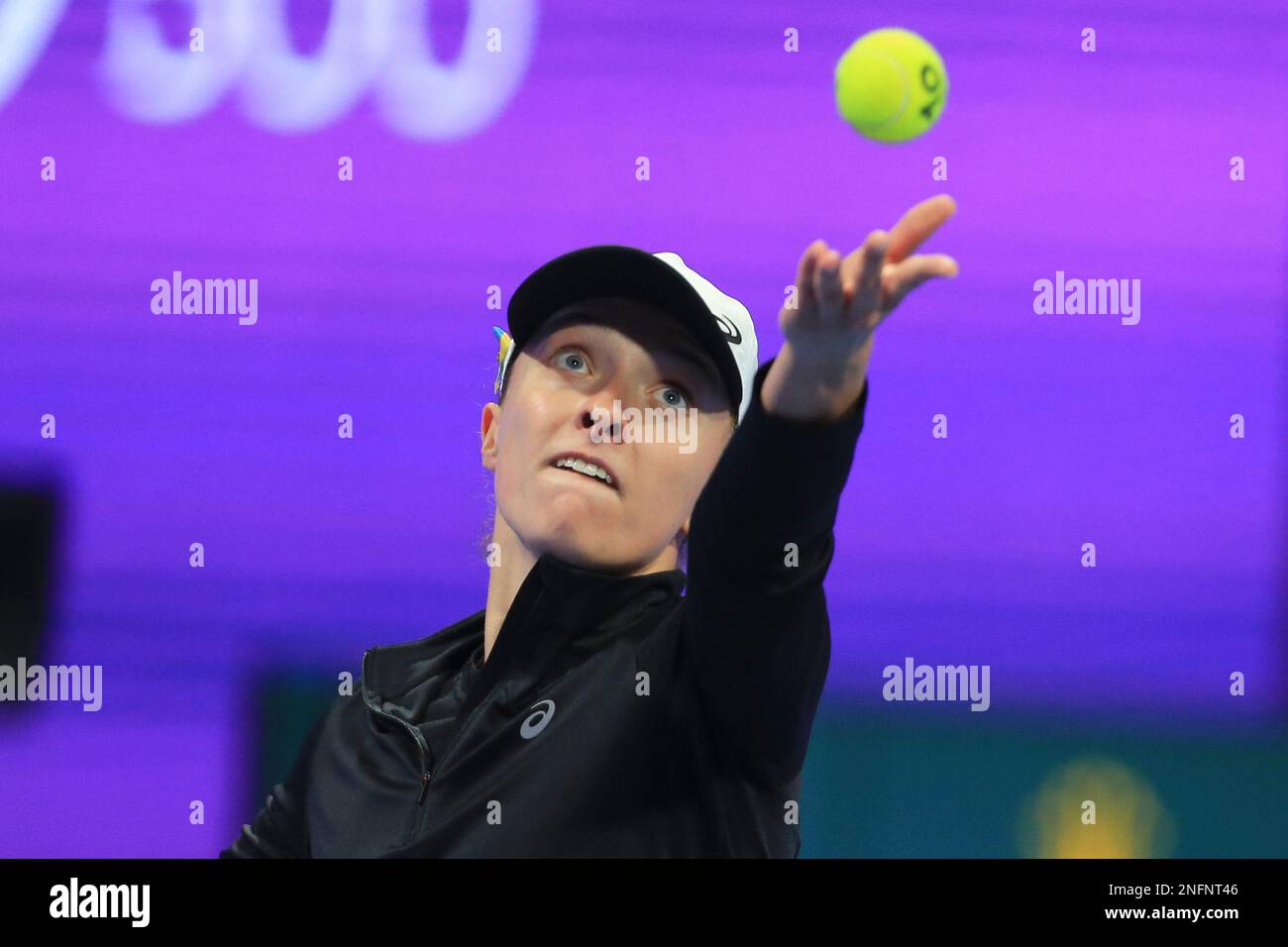 Iga Swiatek of Polandserves to Veronika Kudermetova of Russia during a ...