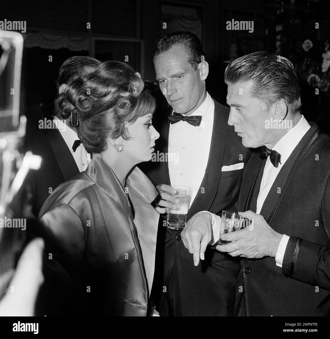 Italy's Gina Lollobrigida, American actor Charlton Heston, and American ...