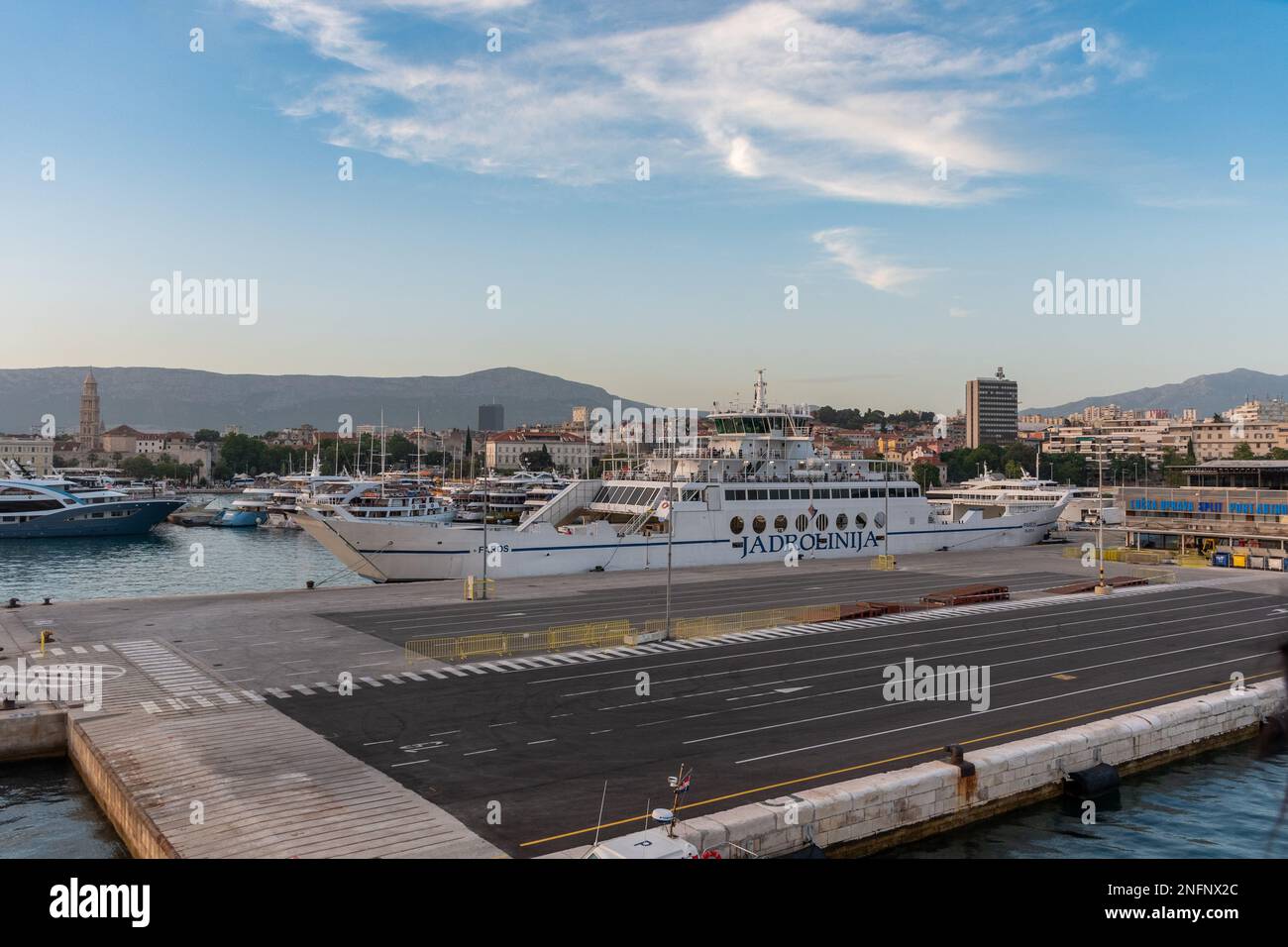 Many Ships docked in the ferry port in Split, Croatia with blue sky ...