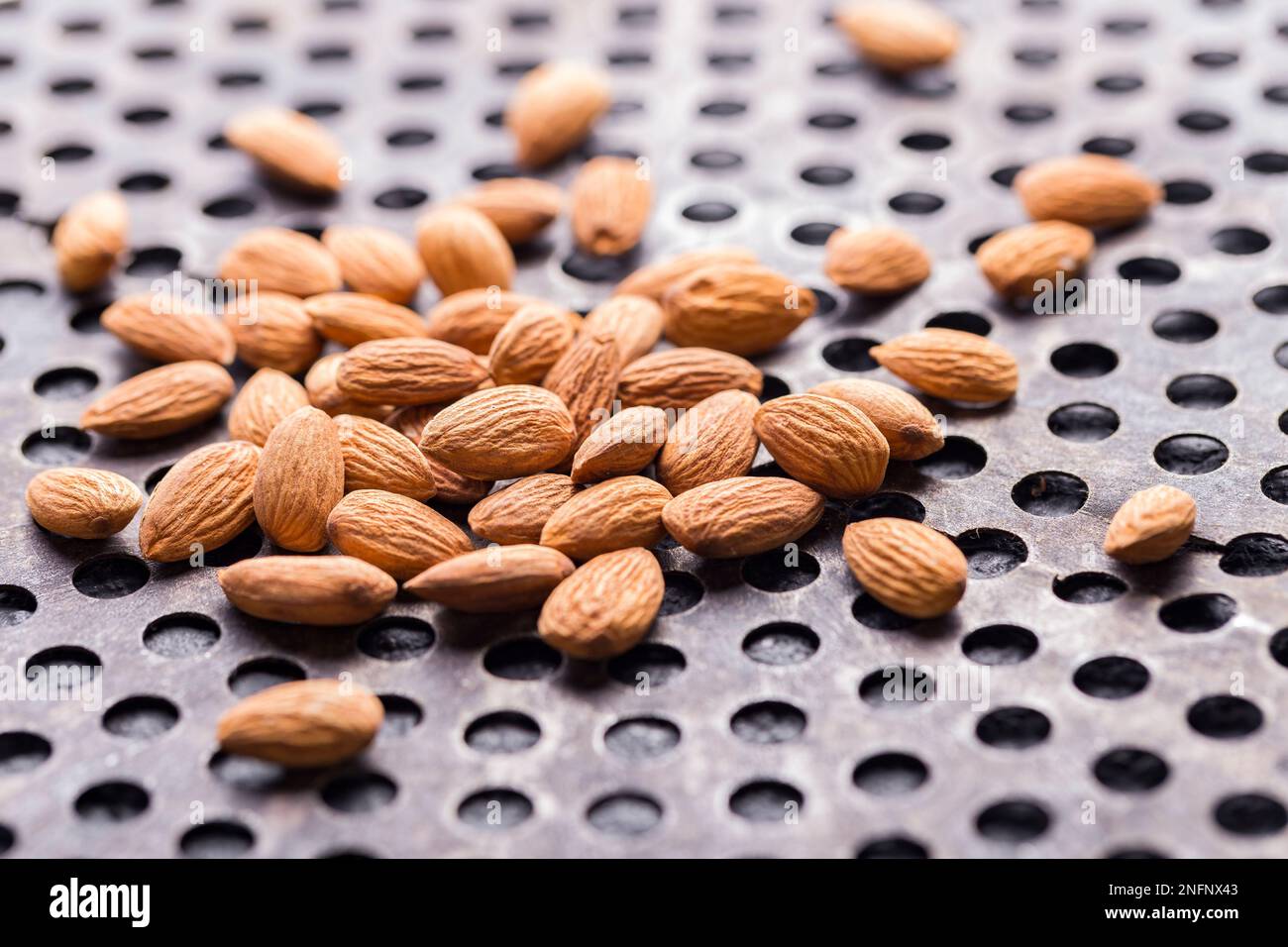 pile of natural almonds (Prunus dulcis) close-up image Stock Photo - Alamy