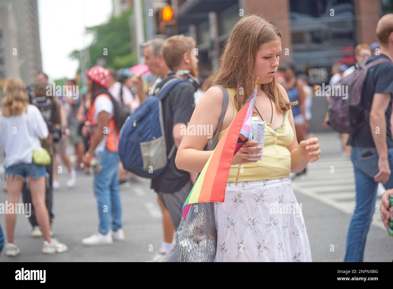Toronto Ontario, Canada- June 26th, 2022: A lady holding the pride flag ...