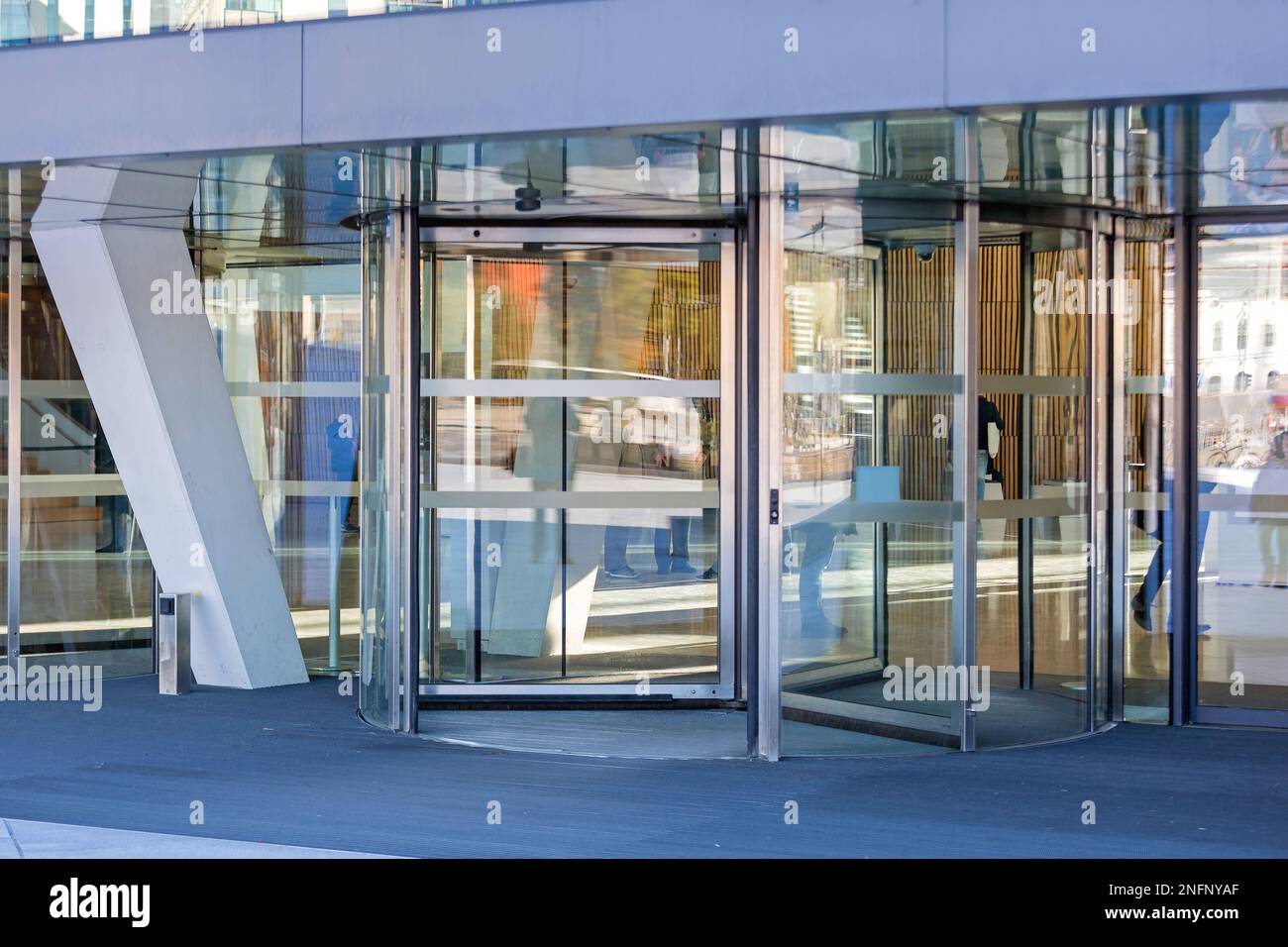 Automatic Revolving Doors at Modern Building Entrance Stock Photo - Alamy