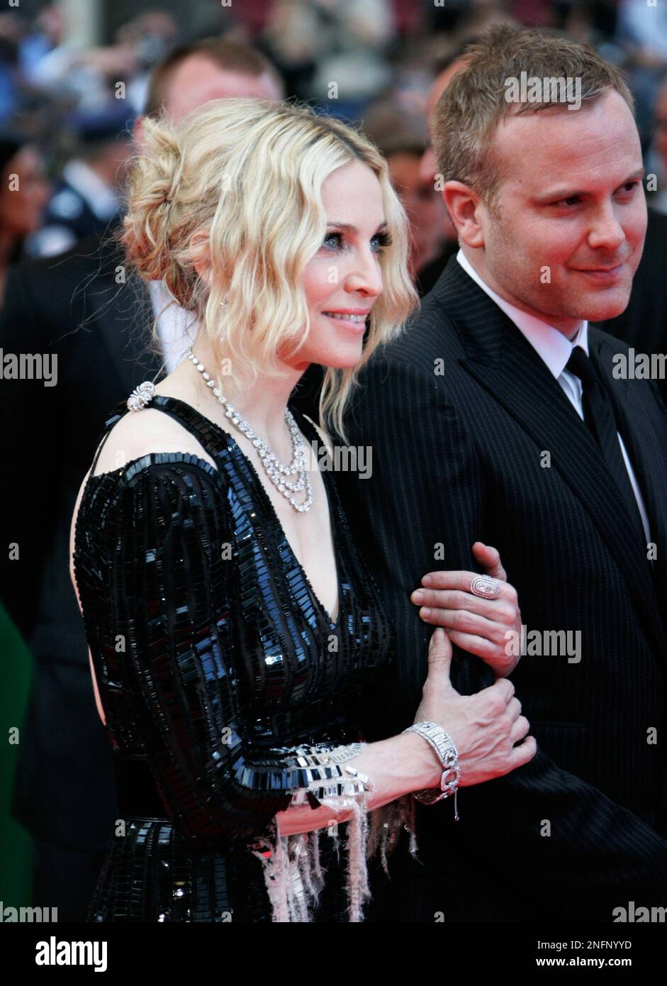 Madonna and director Nathan Rissman arrive for the premiere of the film ...