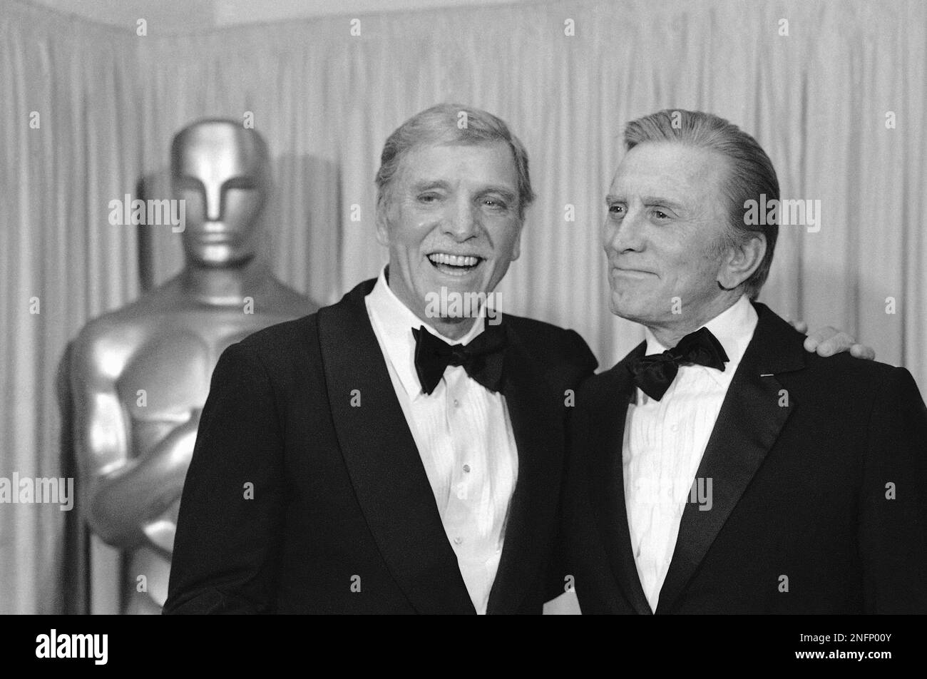 Actors Burt Lancaster, left, and Kirk Douglas are shown during the Academy Awards in Los Angeles ...