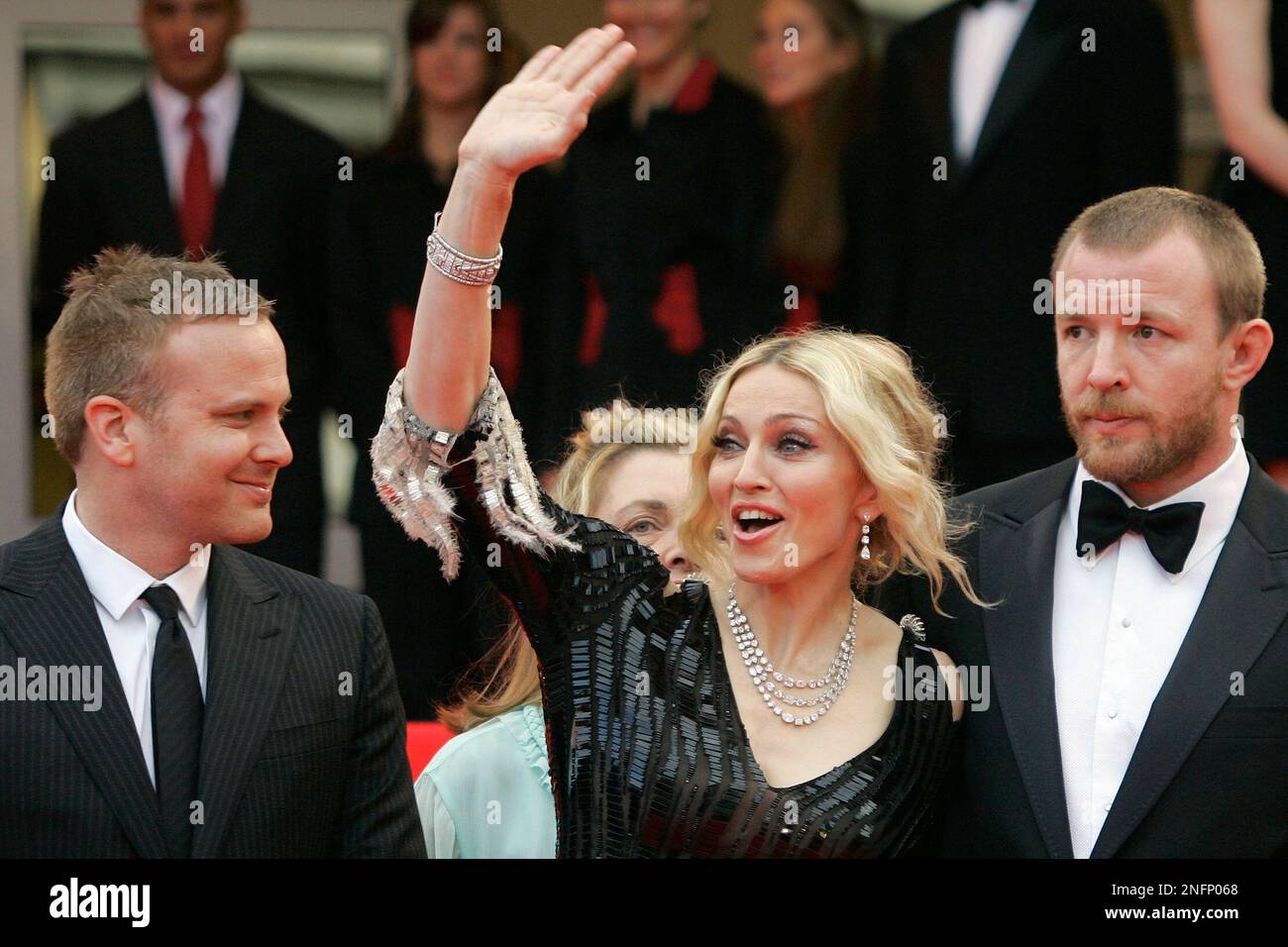From left, director Nathan Rissman, Madonna and husband director Guy ...