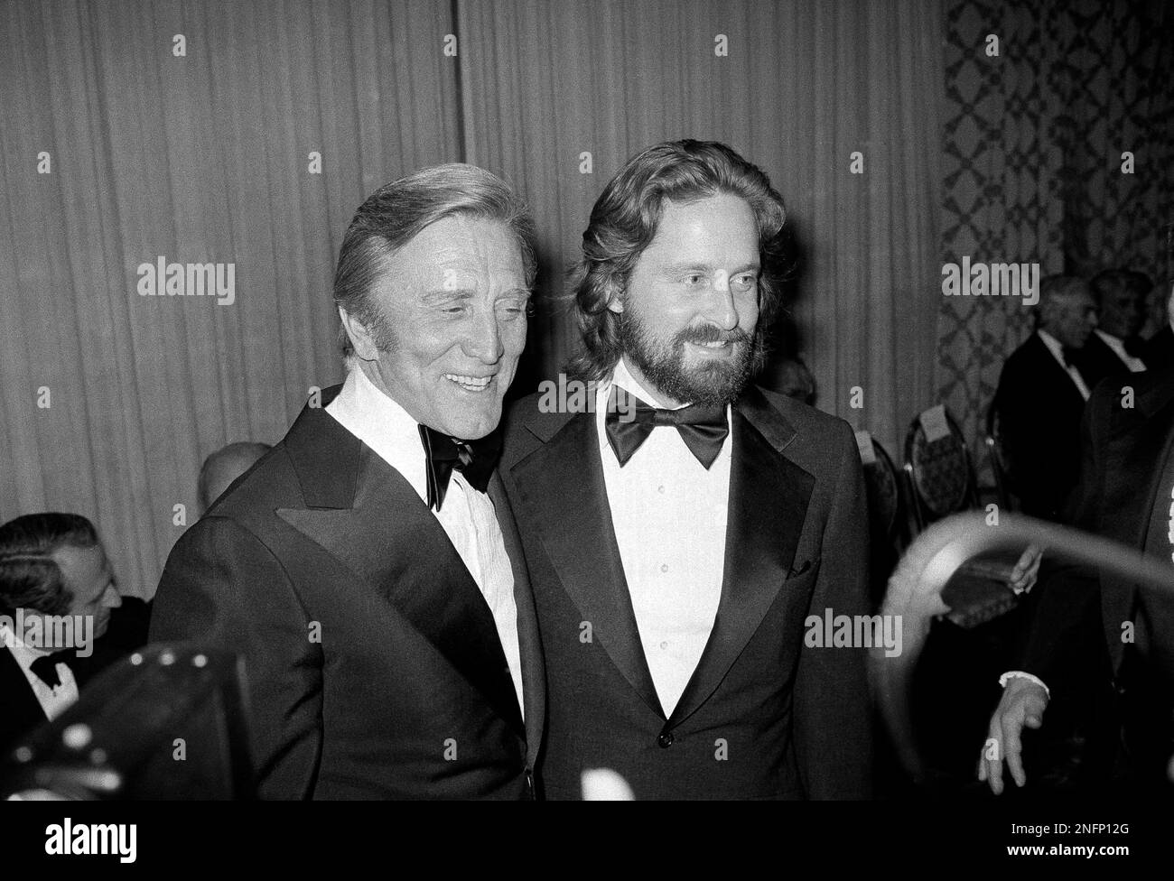 Actor Kirk Douglas is seen posing with his son Michael Douglas, at ...