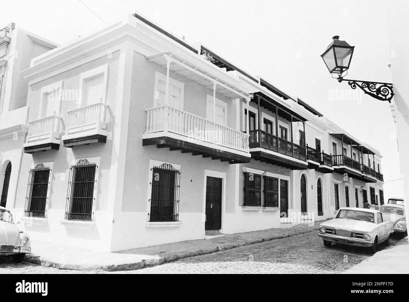 Carefully restored houses grace a historic street in Old San Juan ...