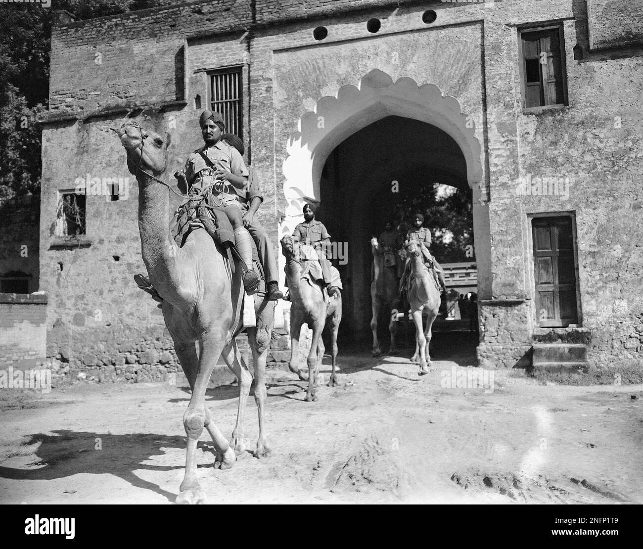 Soldiers of the 1st Battalion, Sikh Regiment, armed with seven guns ...