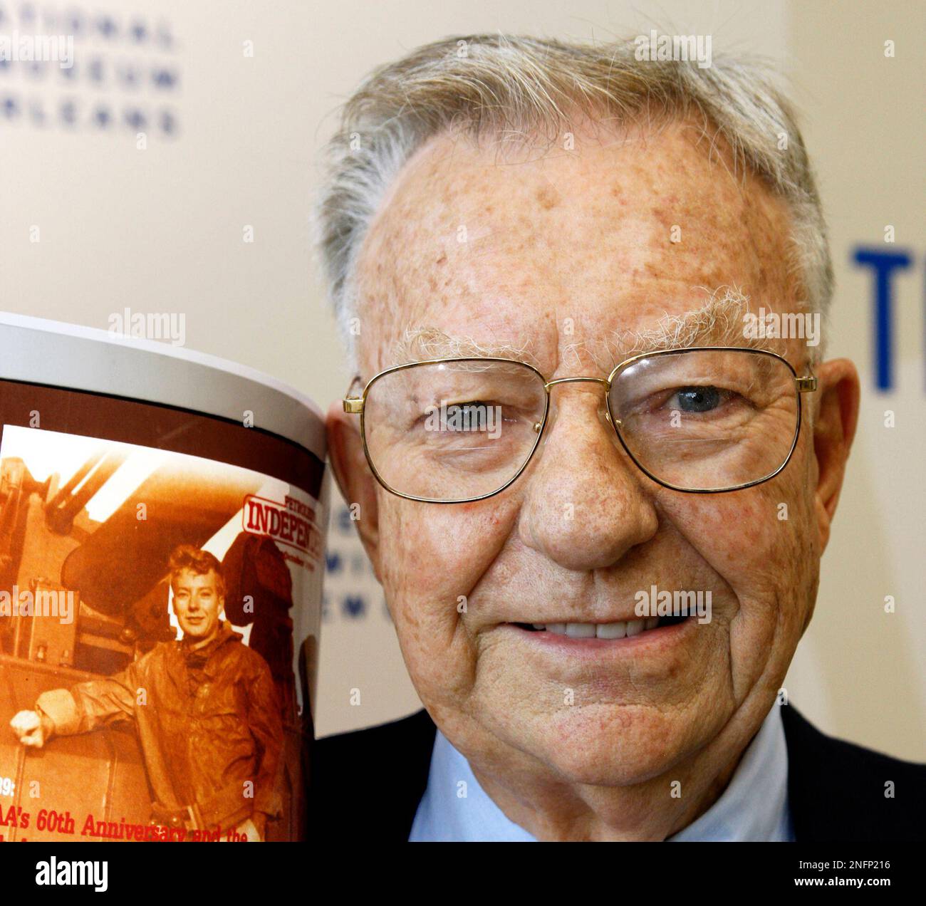 Paul HIlliard, 82, holds an image made of him aboard a ship July 1945 ...