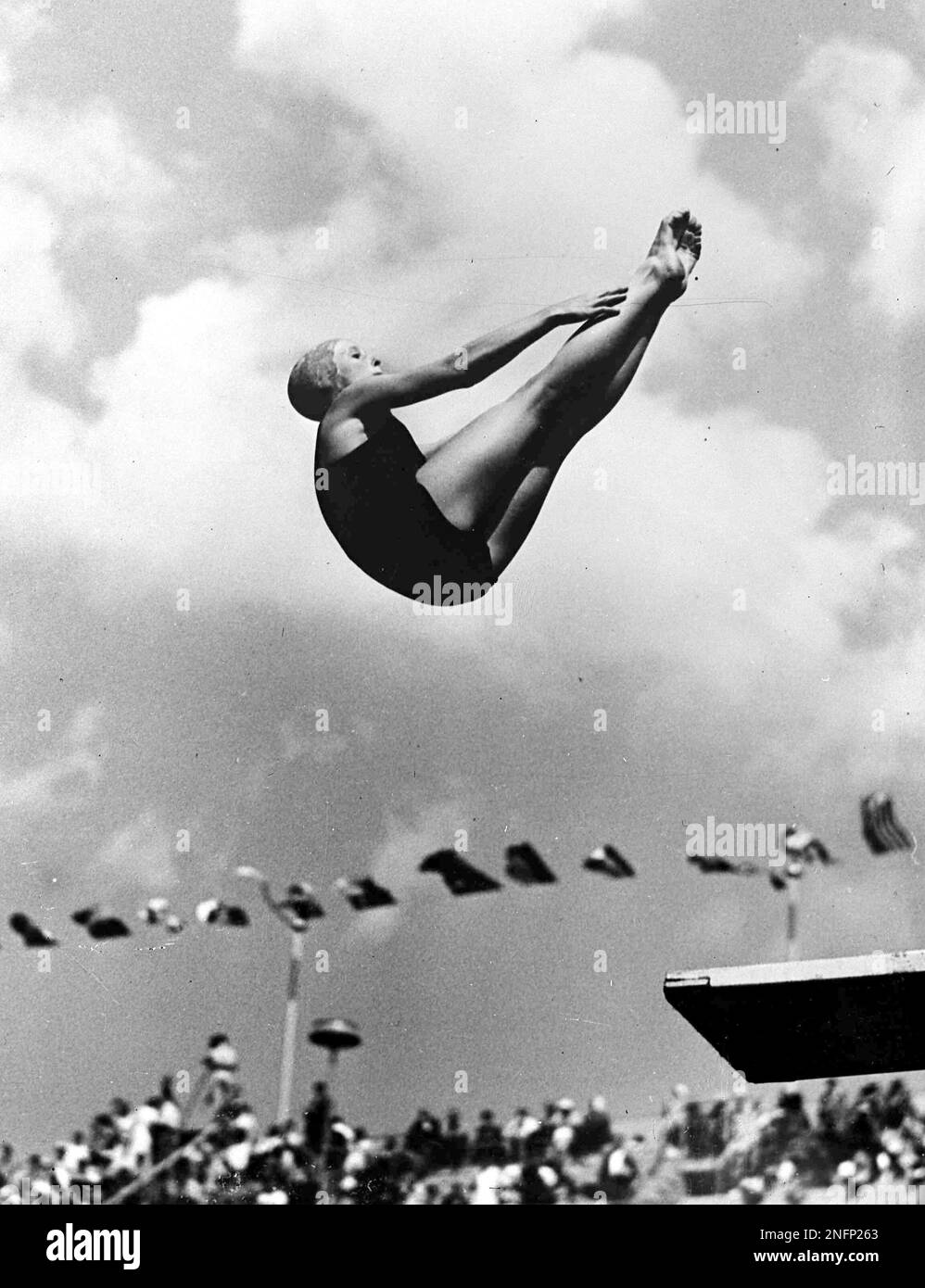 13-year-old American Marjorie Gestring completing her dives to win the ...