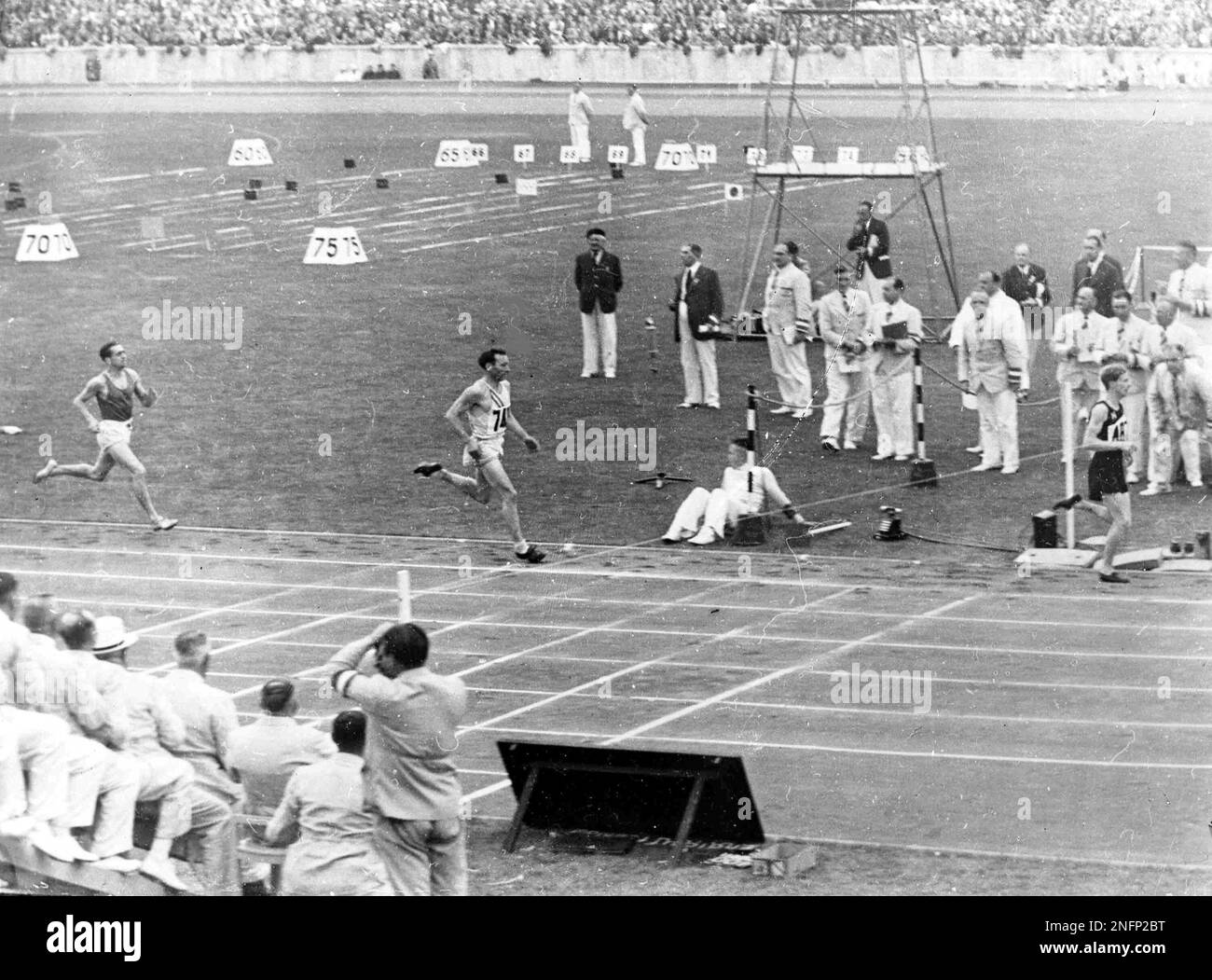 John Lovelock of New Zealand, all in black, right, wins the Final of ...
