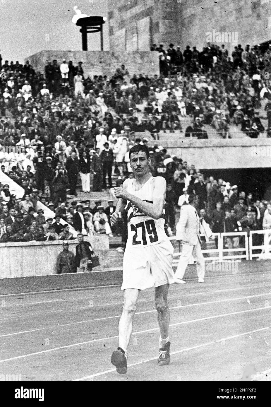 Britain's Hector Harold Whitlock enters the Olympic Stadium as wins the ...