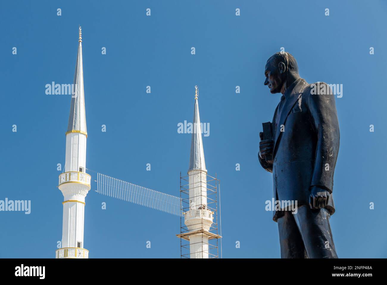 Turgutreis central mosque with statue Stock Photo - Alamy