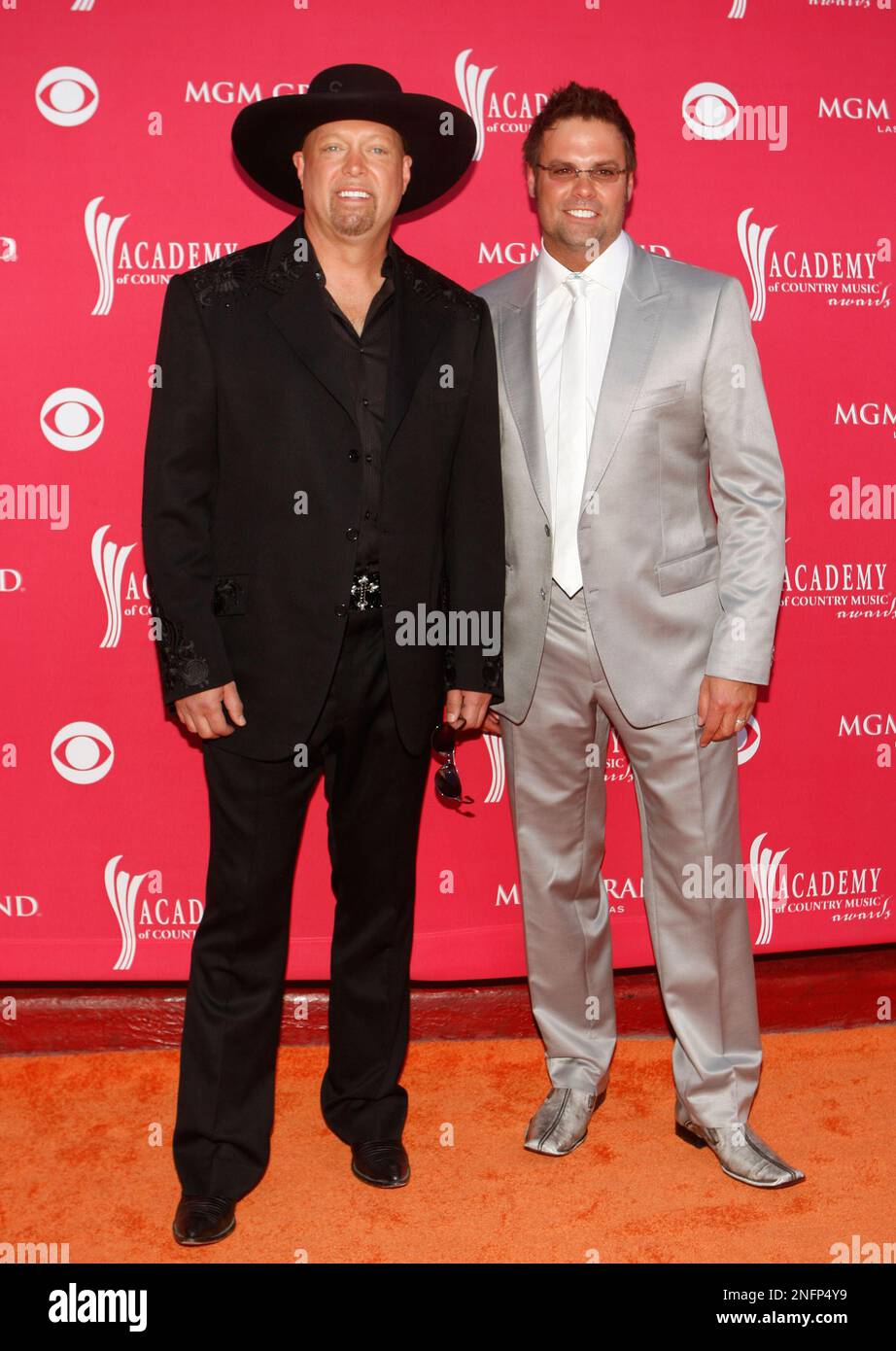 Eddie Montgomery, left, and Troy Gentry, of Montgomery Gentry arrive at ...