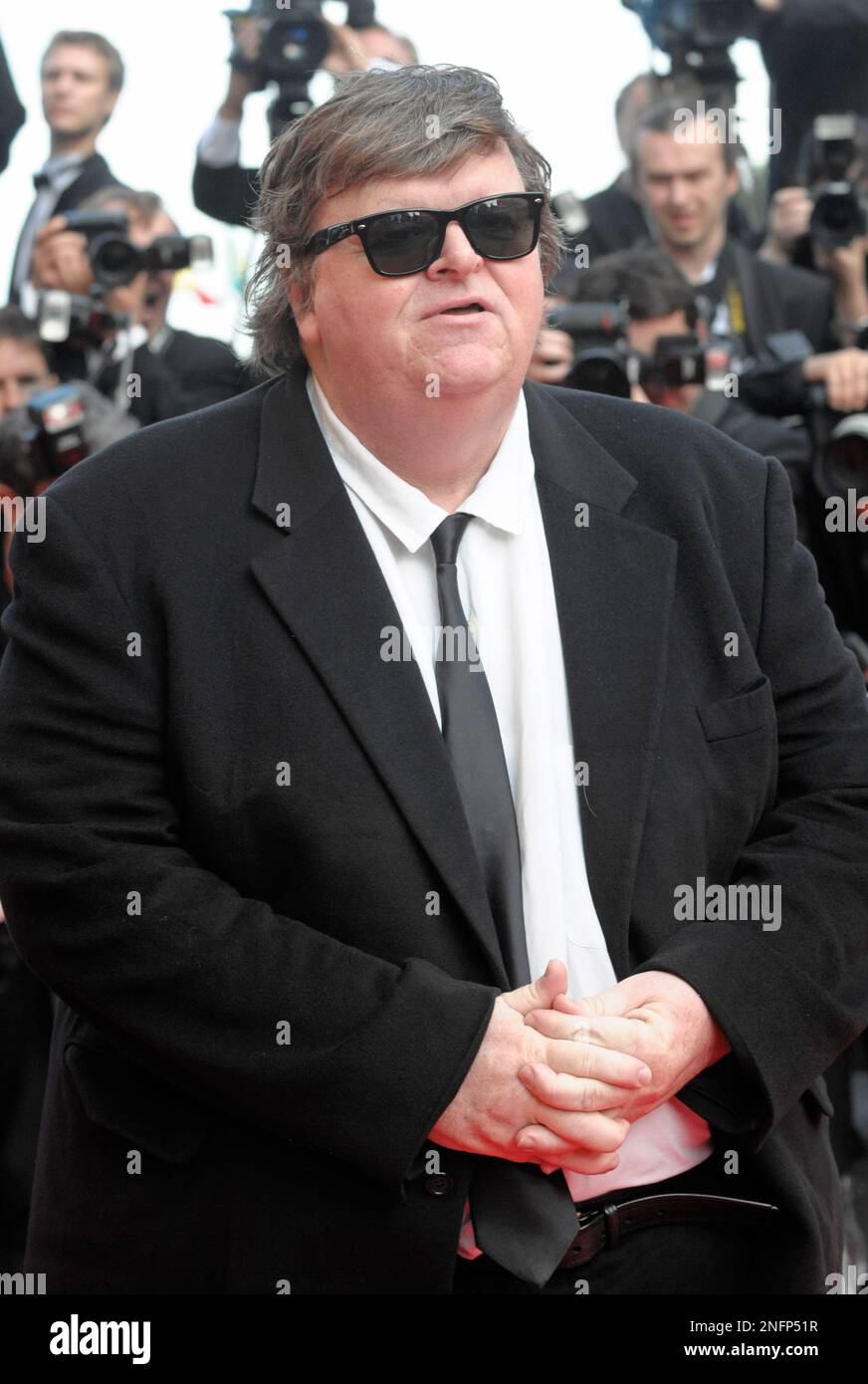 American director Michael Moore arrives for the premiere of the film ...