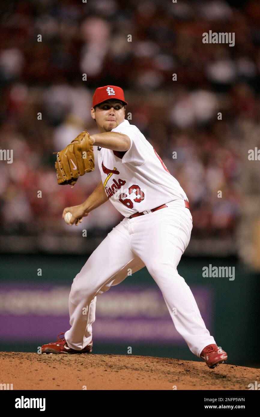 St. Louis Cardinals relief pitcher Chris Perez throws during a baseball game against the Tampa ...