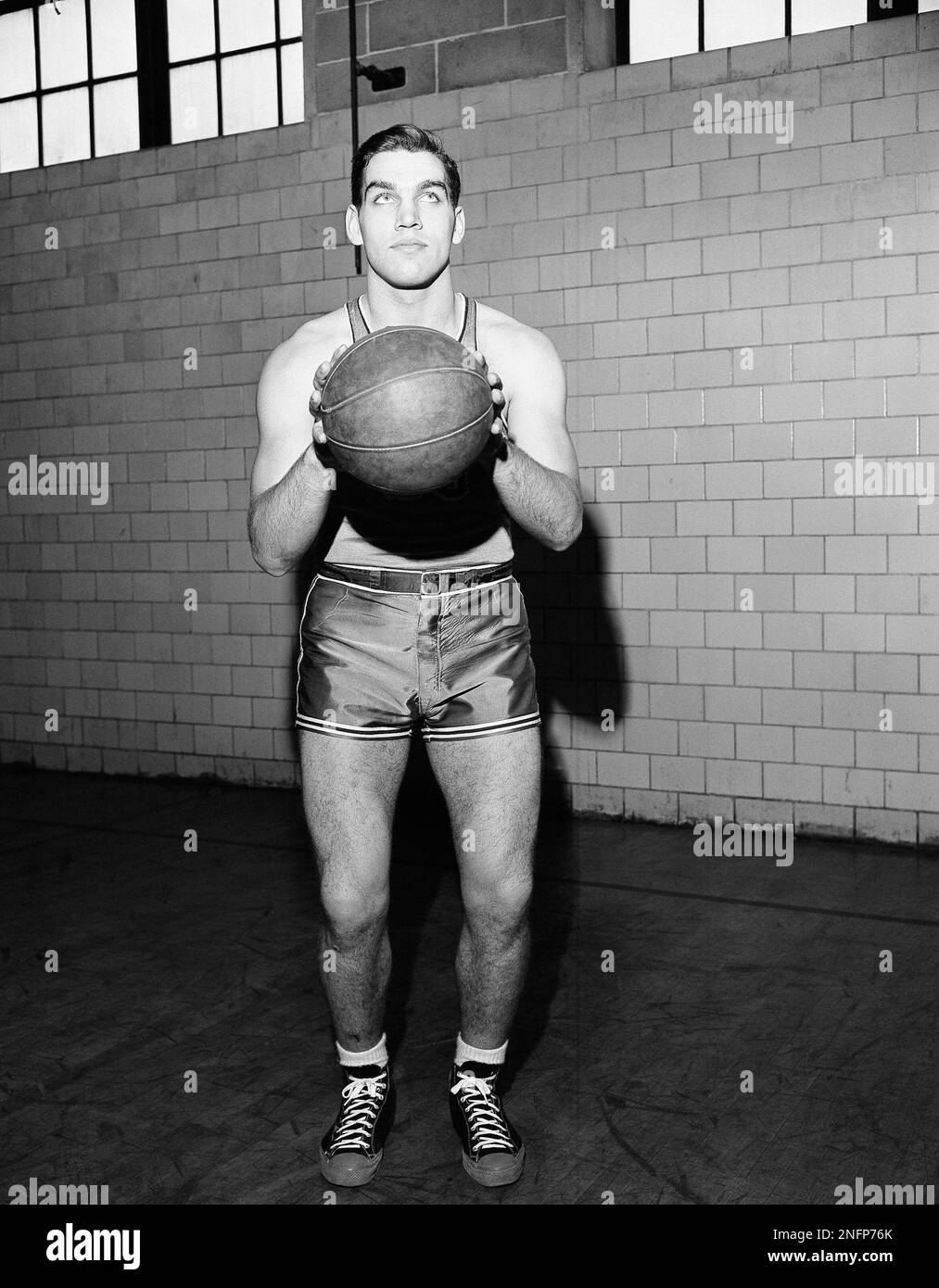 George Connor, guard of Chicago, Ill, shown on Feb. 23, 1947, is also a ...