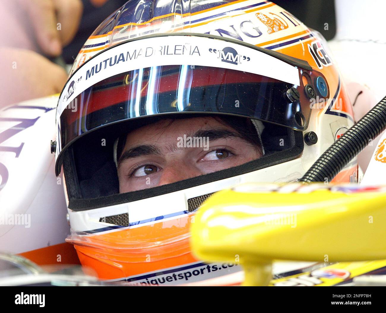 Brazil's Formula 1 Renault driver Nelson Piquet Jr sits in his car ...
