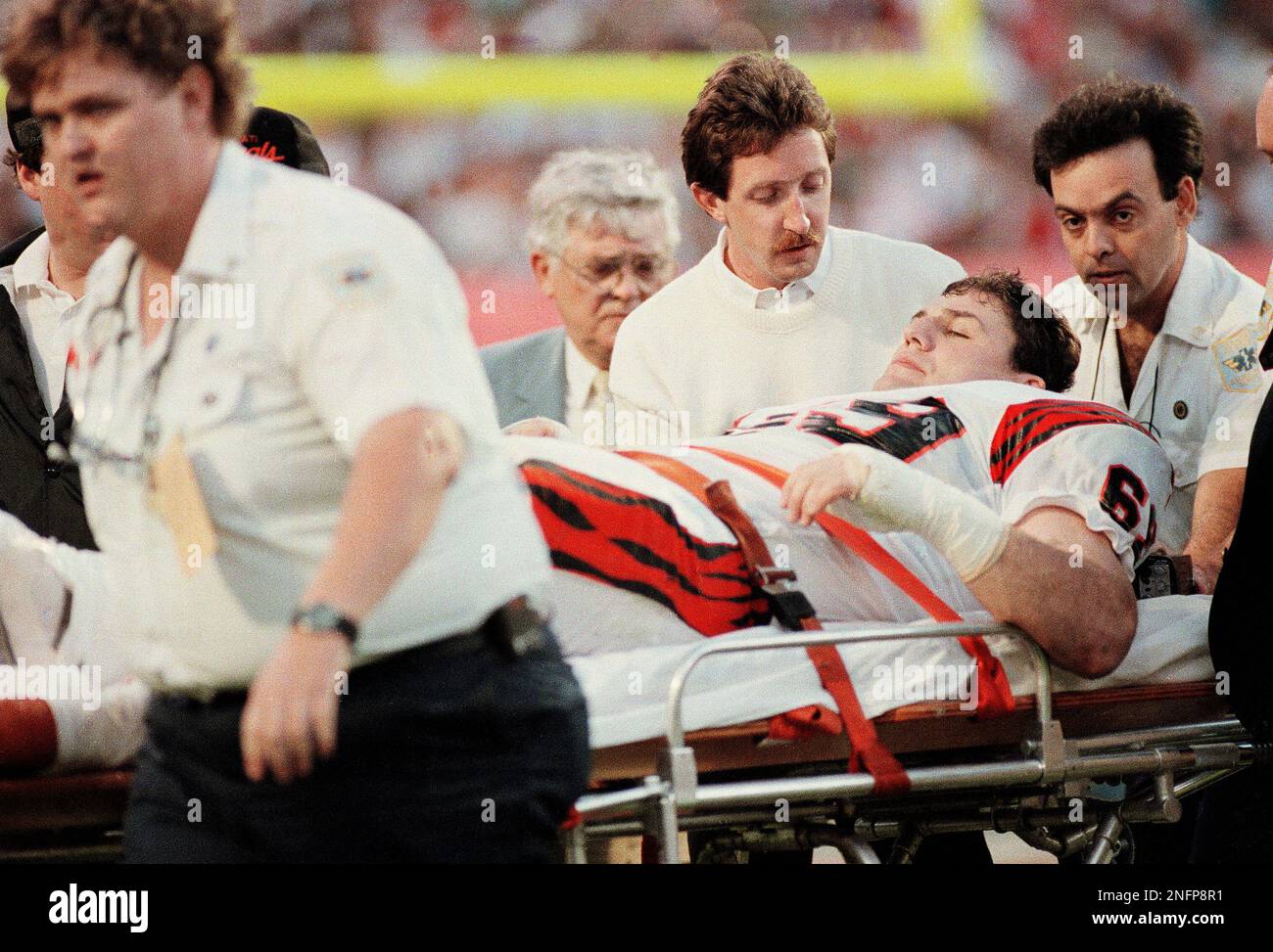 Cincinnati Bengals nose tackle Tim Krumrie, 69, is carried off the ...