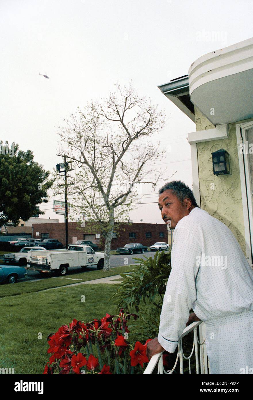 John Thorne stands on his front porch in his pajamas Saturday, April 17 ...