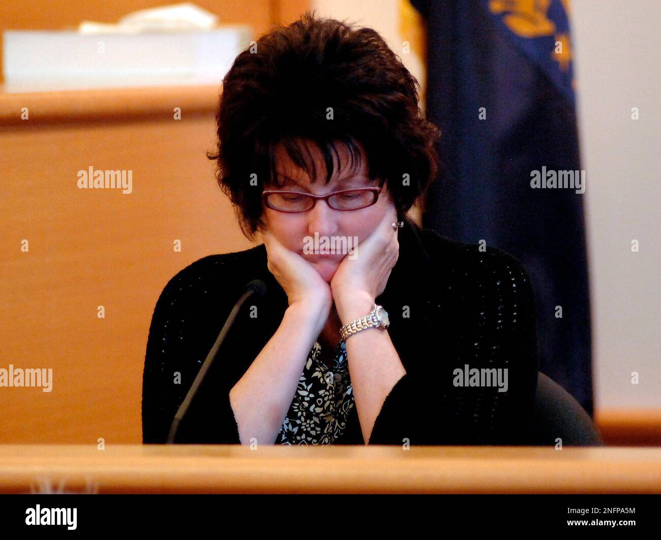 Lynn Noojin, sister of admitted murderer Sheila LaBarre, rests for a ...