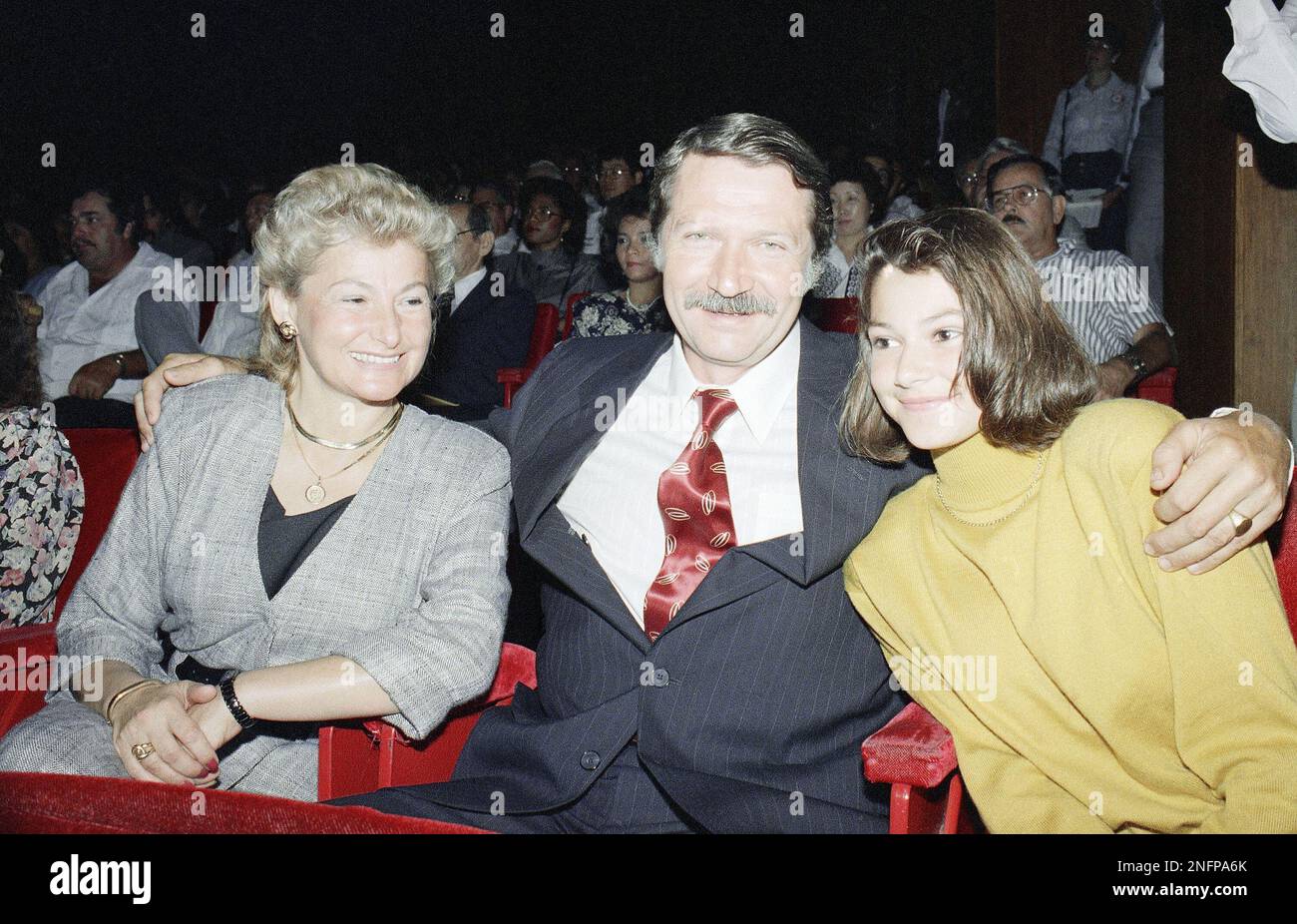 Internationally known gymnastics coach Bela Karolyi, flanked by his ...