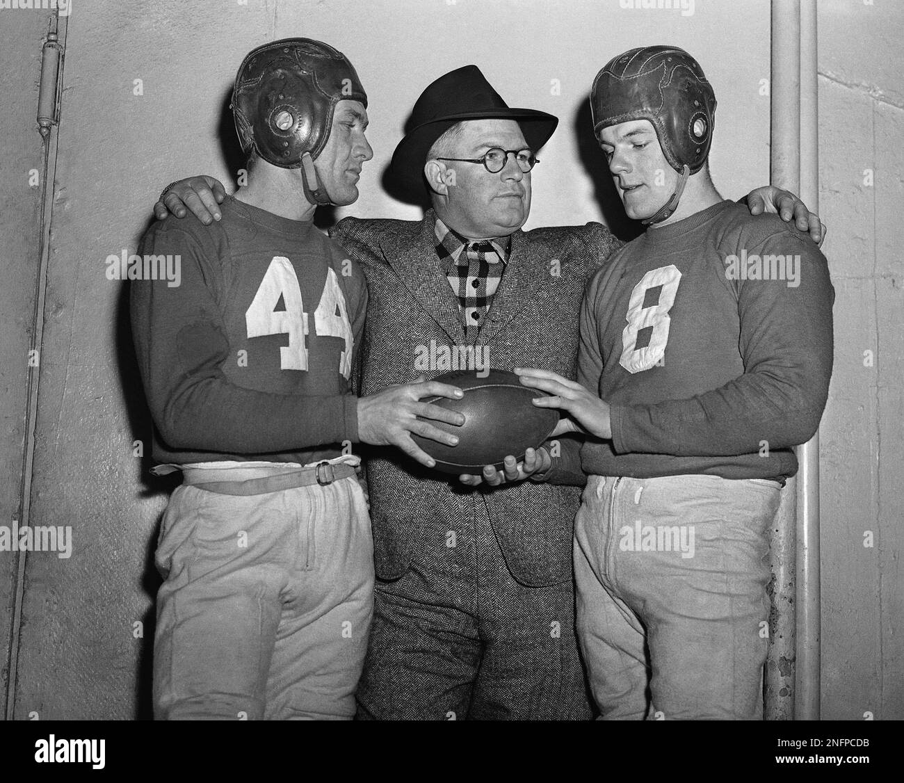 Coach Steve Owen, of the New York Giants, talks with his rookie stars ...
