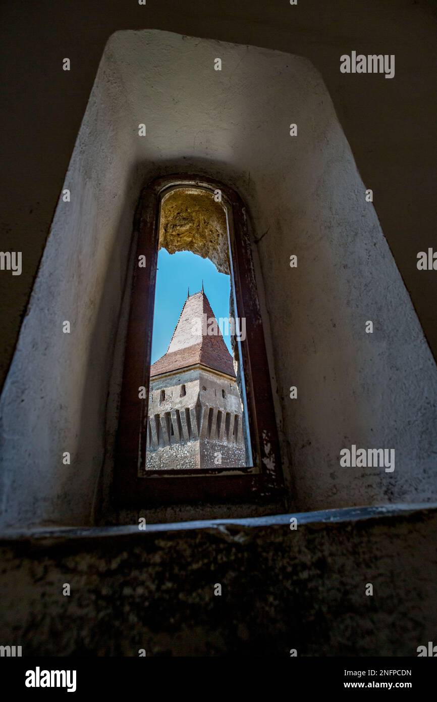 Framed window view of one tower, Corvin Castle, or "Castelul Corvinilor ...