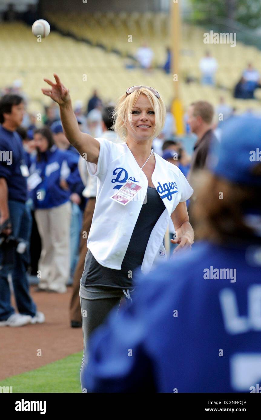Actress Pamela Anderson plays catch with her son Brandon before ...