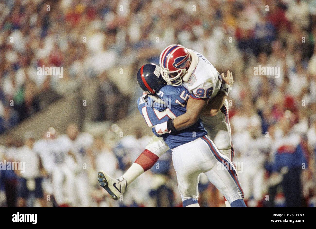 Leon Seals (96) of the Buffaio Bills sacks New York Giant quarterback ...