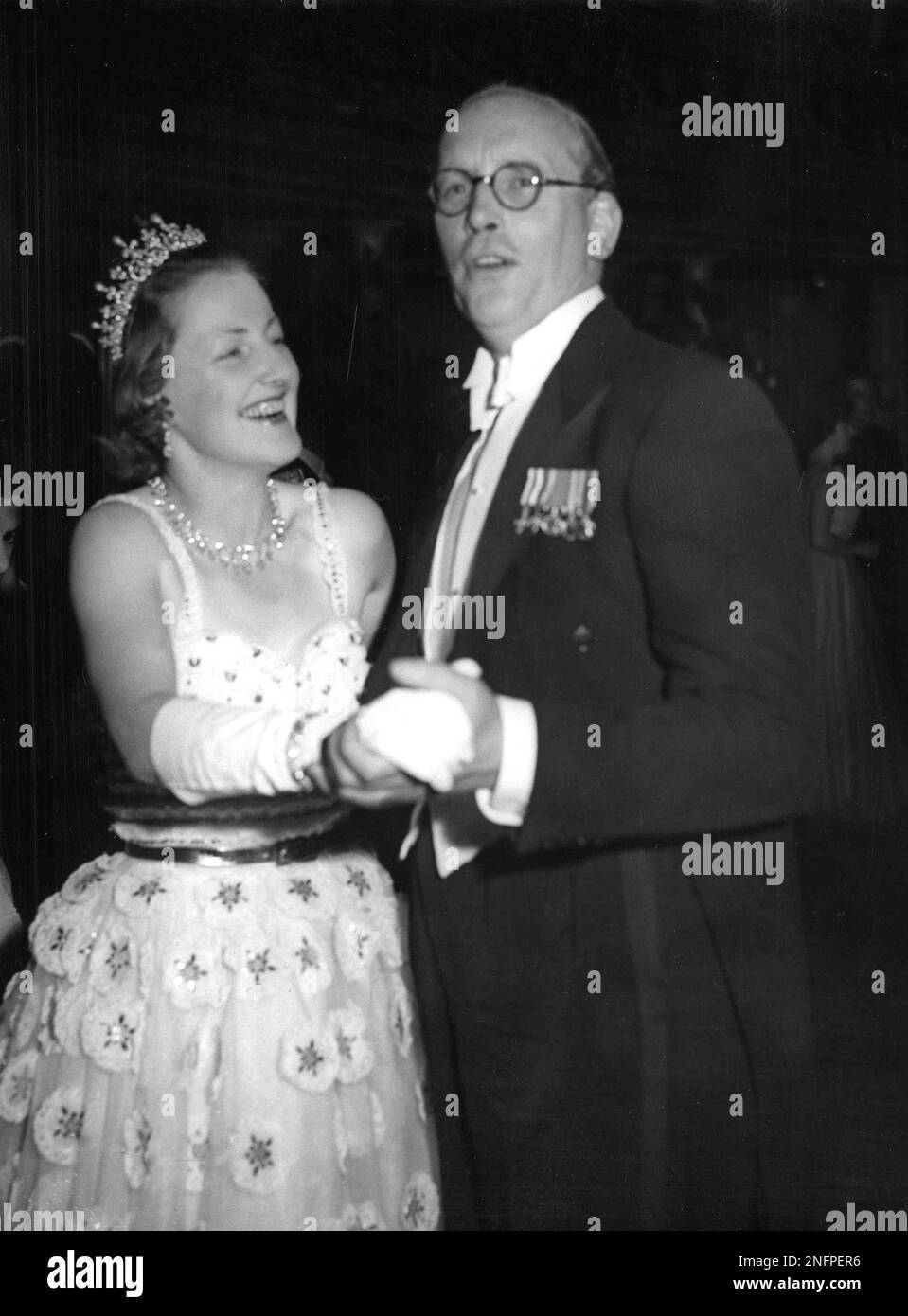 The Duchess of Norfolk dances with Lord Linlithgow at the Royal Albert ...