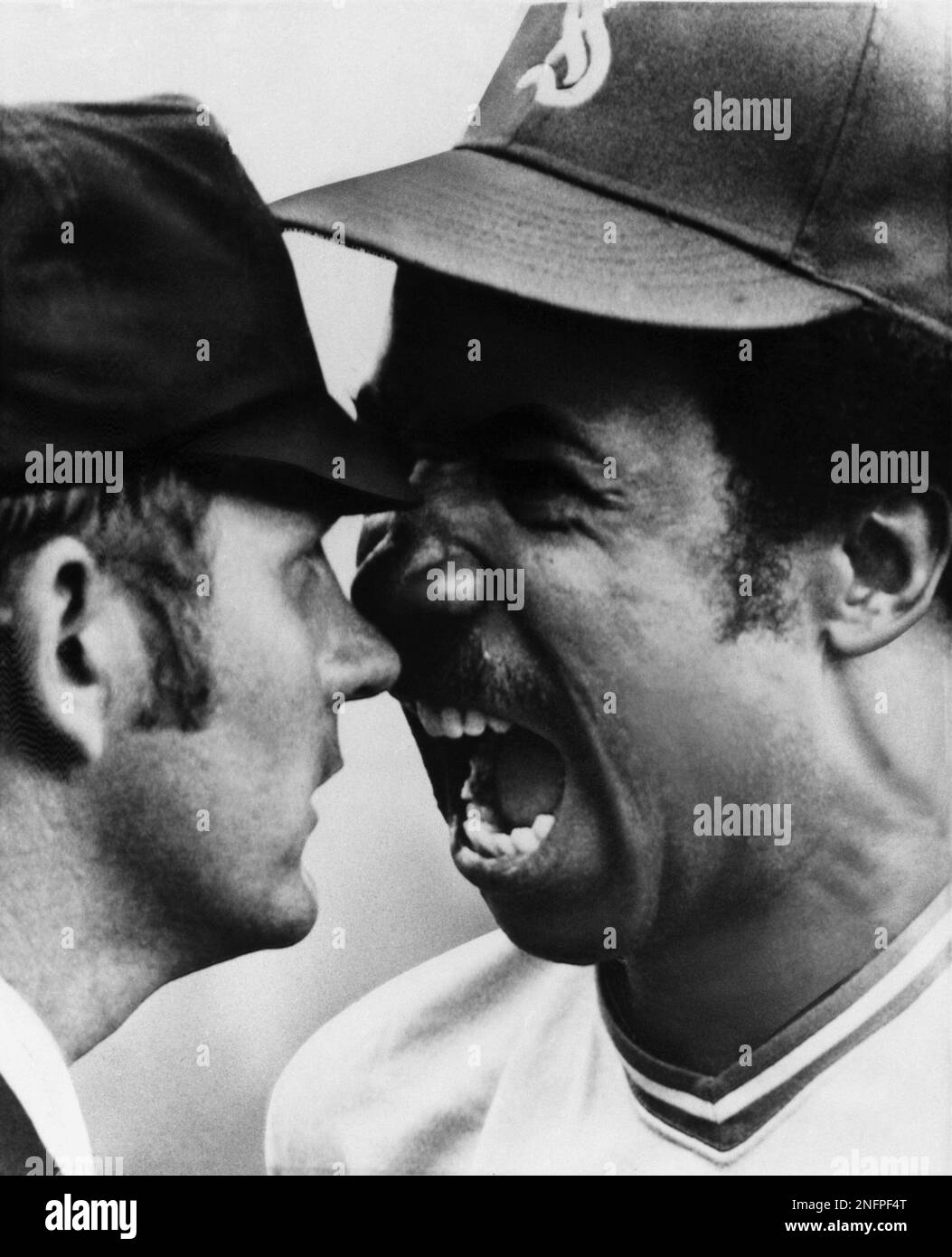 Frank Robinson, right, and umpire Ron Hansen exchange words during the ...