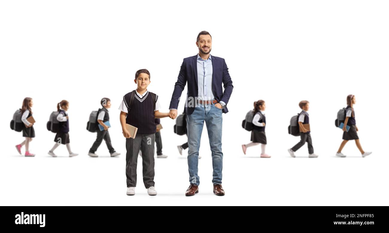 School drop off, father taking son to school and schoolchildren walking ... School drop off, father taking son to school and schoolchildren walking ...