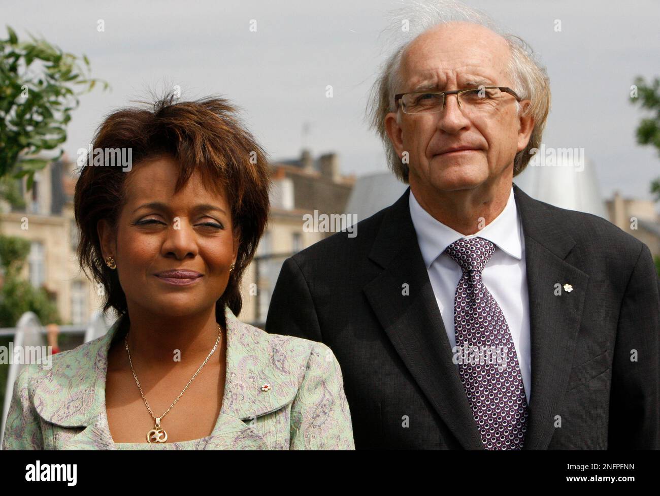 Canada's Governor General Michaelle Jean, left, by the side of her ...
