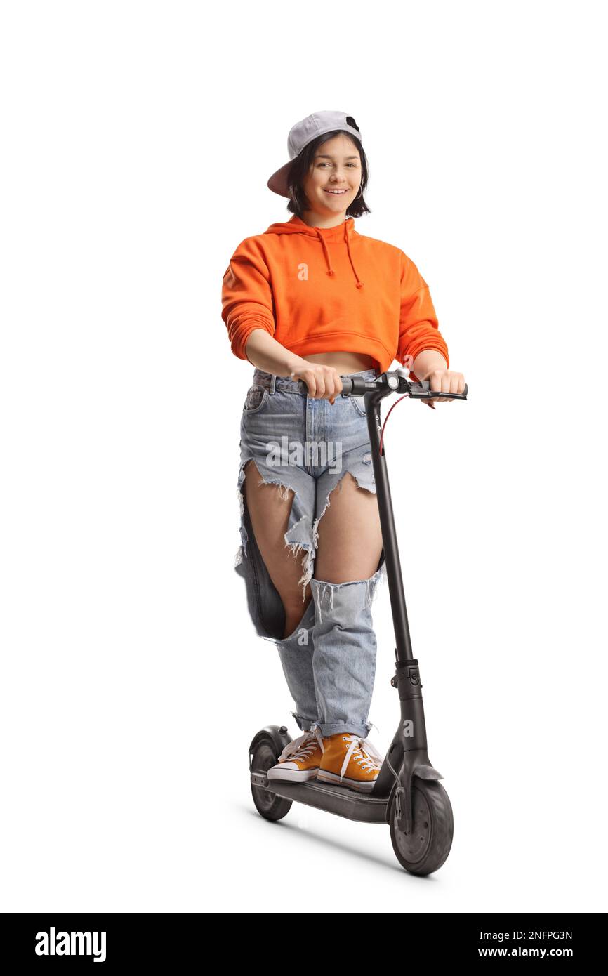 Cheerful generation z female riding an electirc scooter isolated on ...