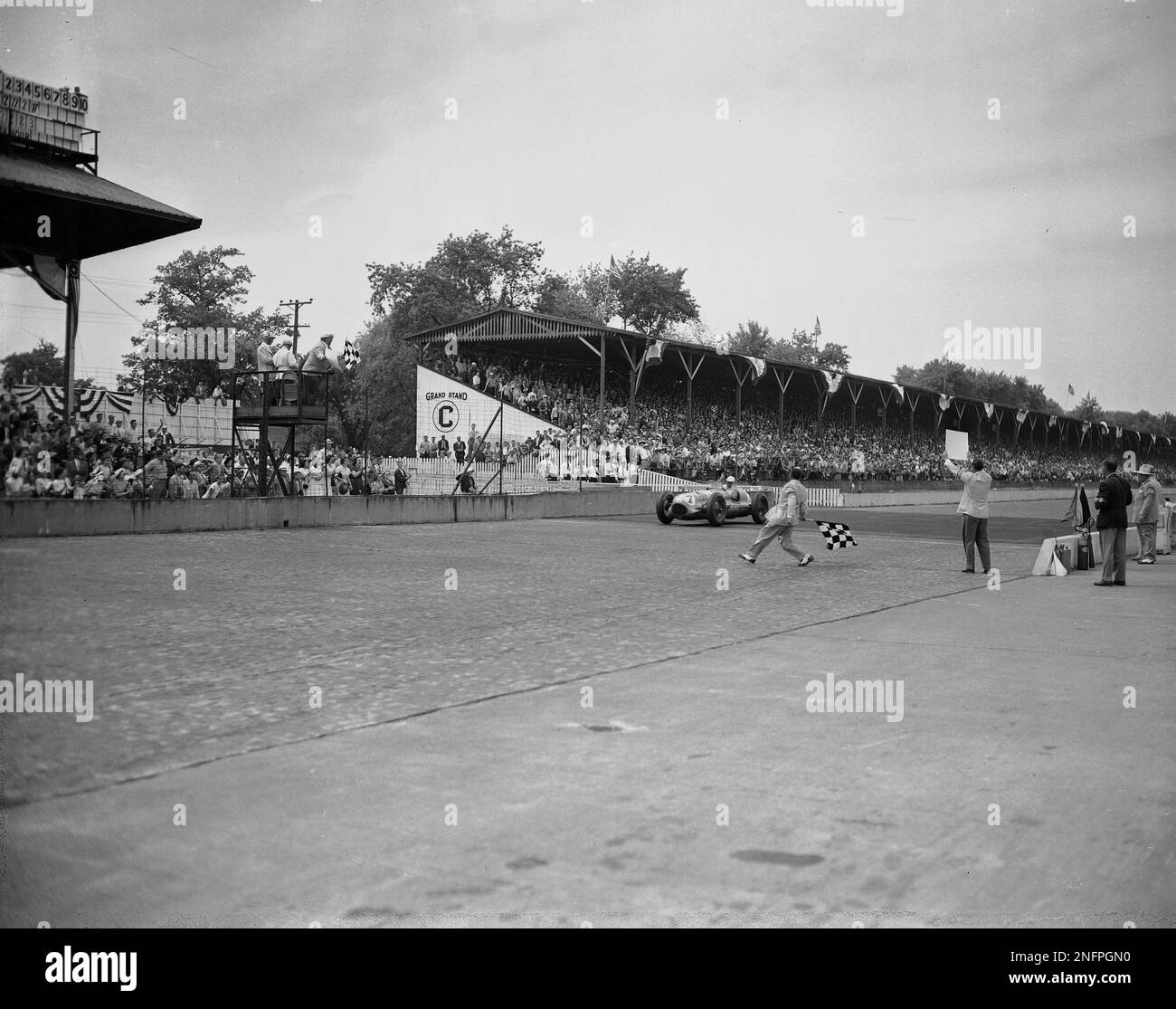 The Blue Baron Special, with Bill Holland at the wheel, flashes past ...