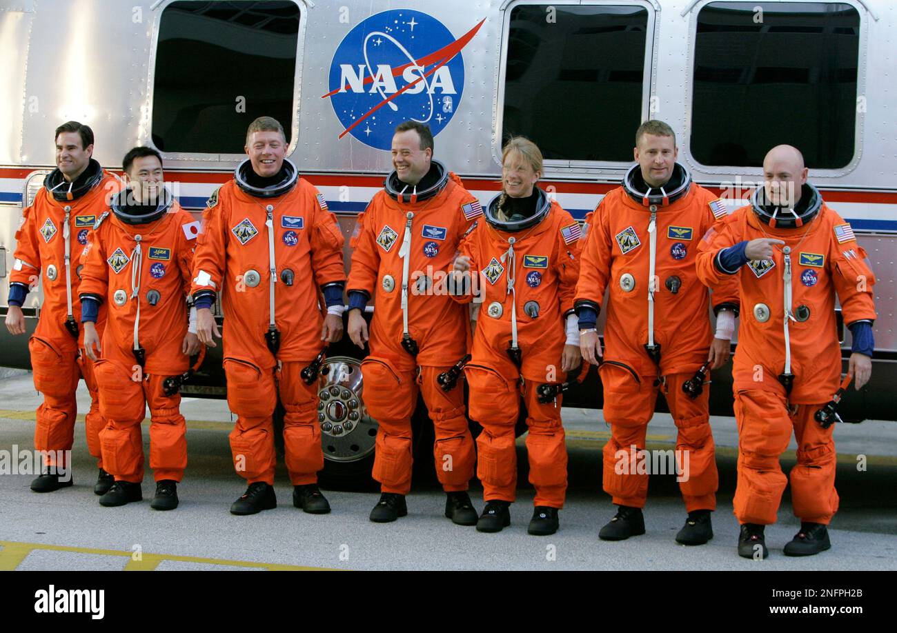 The crew of space shuttle Discovery, from left, mission specialist Greg ...