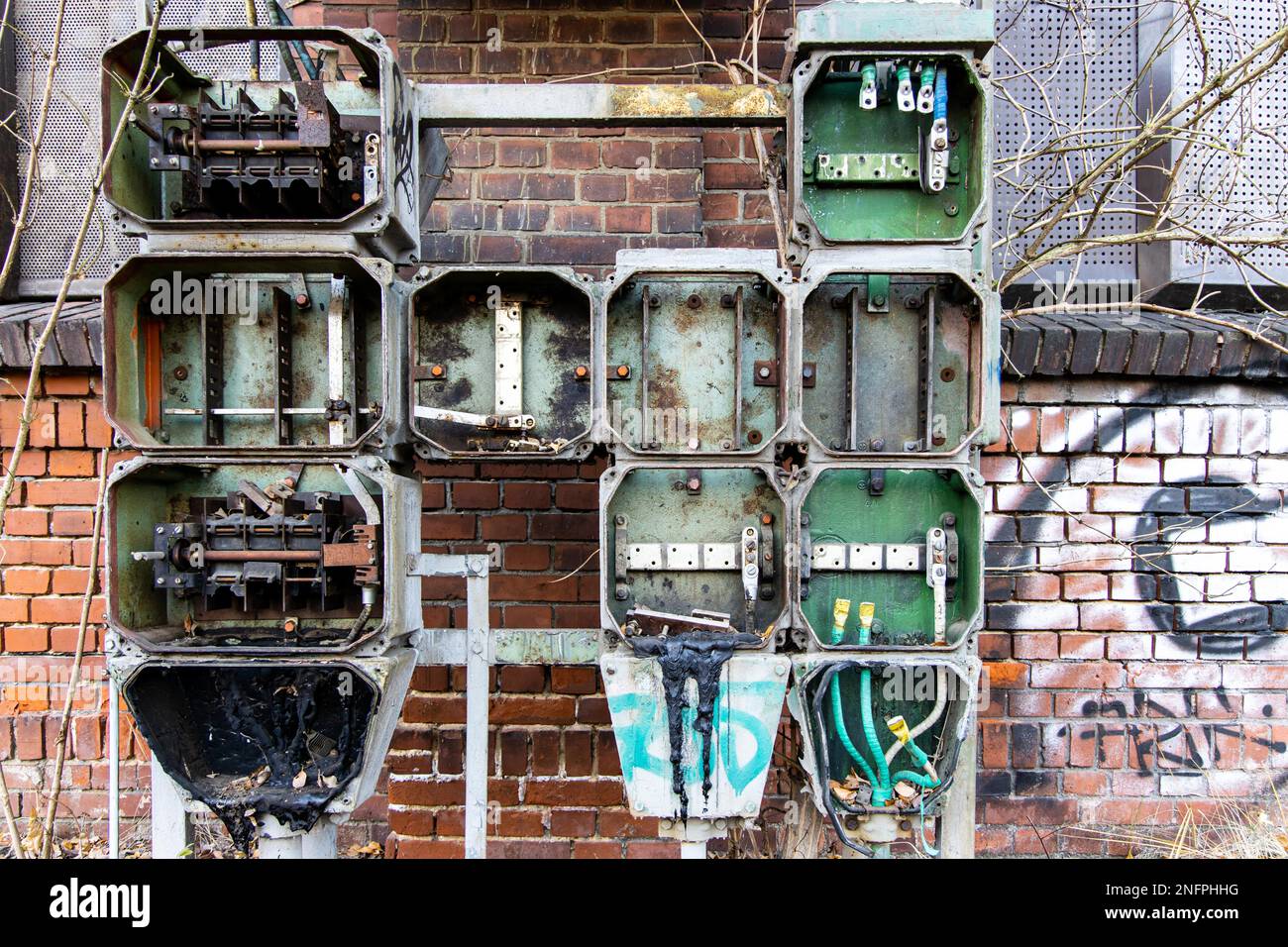 Dilapidated old electrical cast distribution system Stock Photo - Alamy