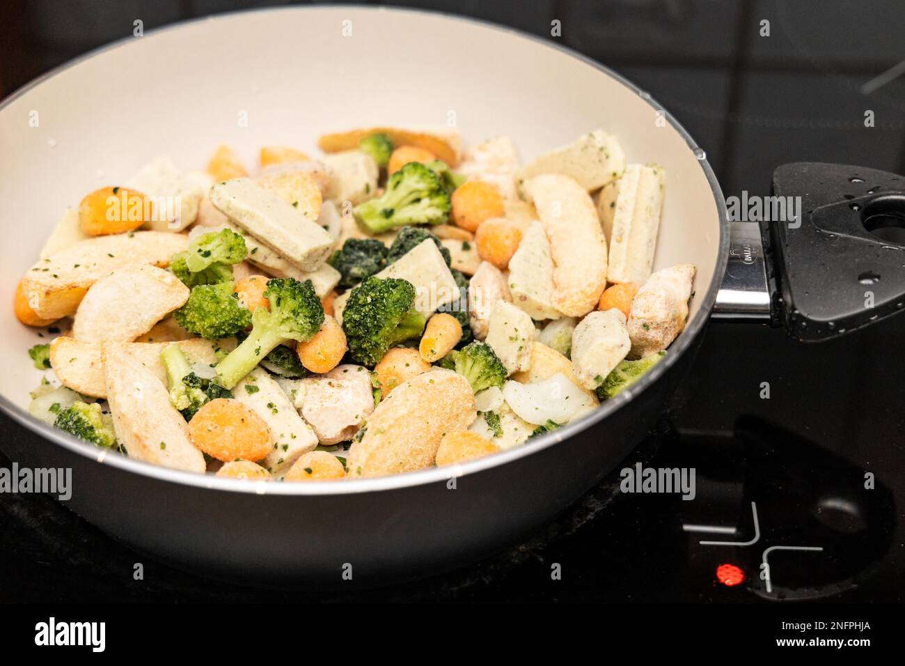 Quick meal vegetable pan Stock Photo - Alamy