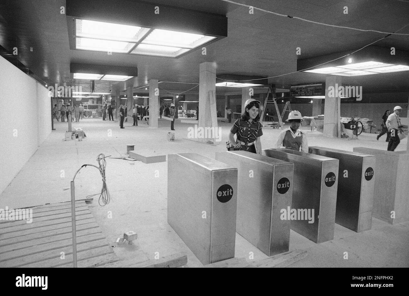 Workers put finishing touches at the new main terminal at the World ...