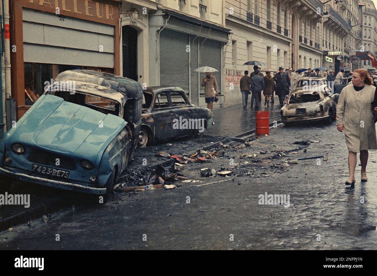 The hulks of burned out vehicles are strewn in the streets Paris' Latin ...