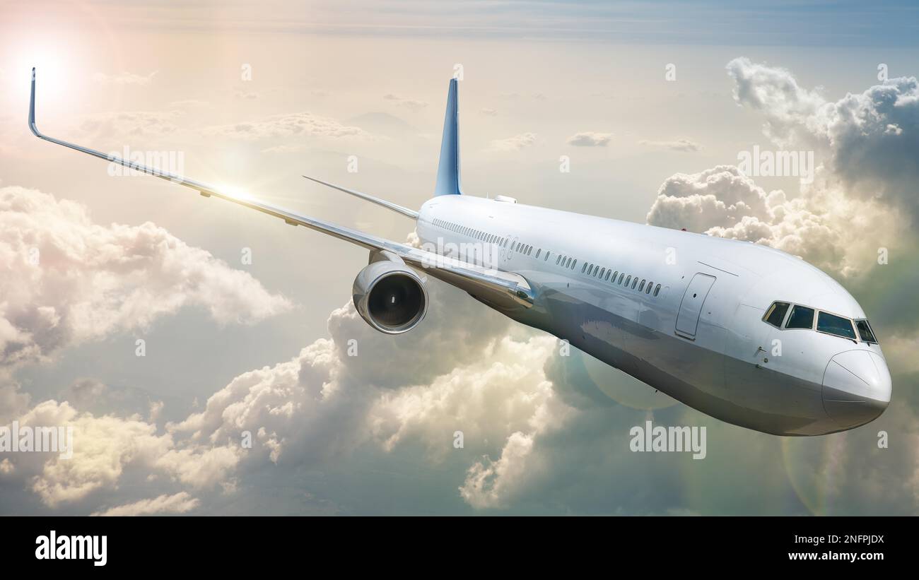 modern aircraft over the clouds Stock Photo - Alamy