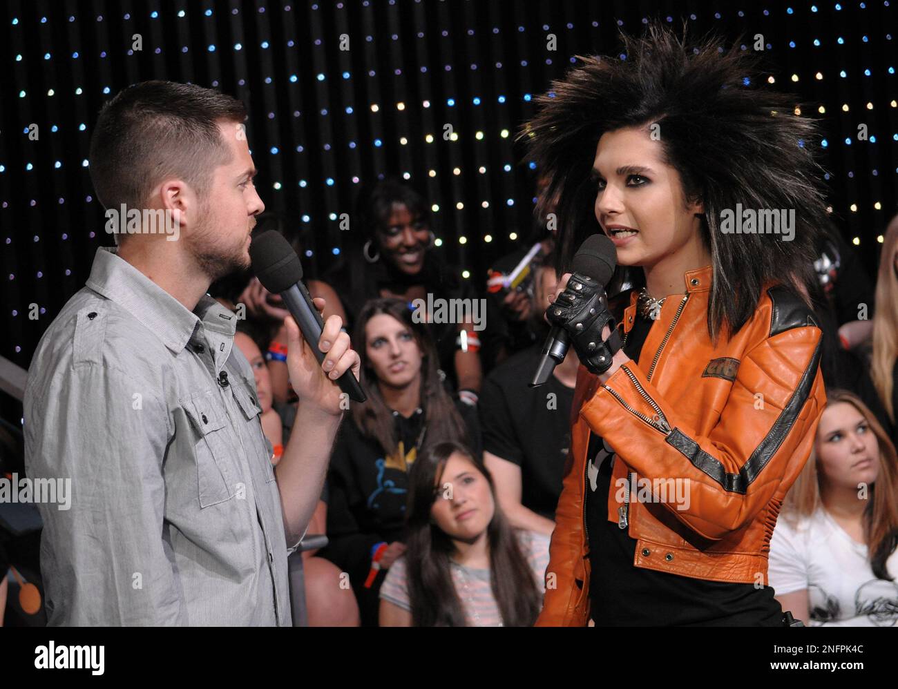 VJ Damien Fahey interviews Tokio Hotel lead singer Bill Kaulitz, right ...