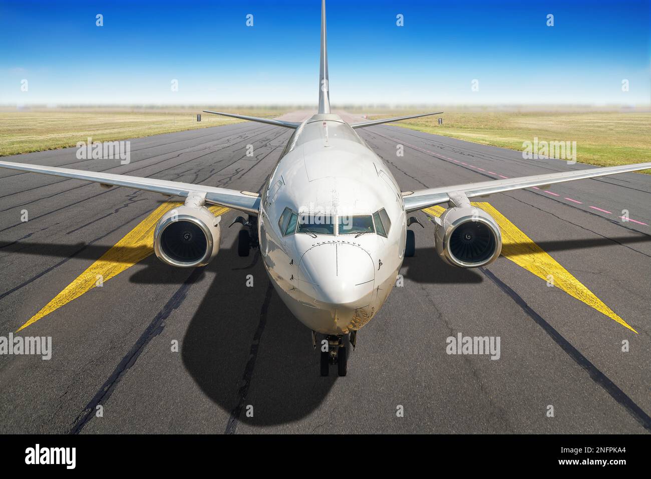 modern airliner on a runway ready for take off Stock Photo - Alamy