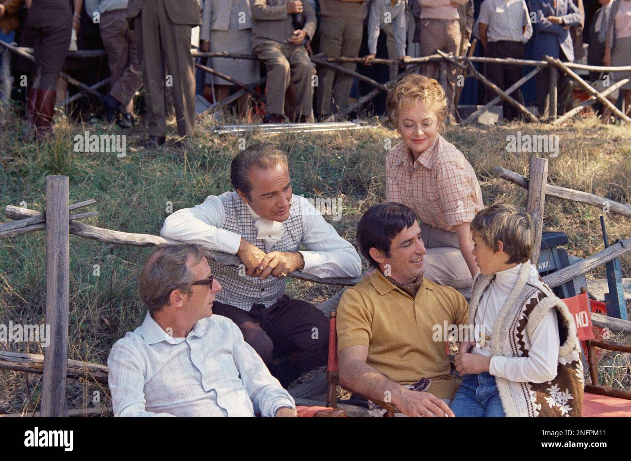 Actress Olivia de Havilland, second from right, looks on as Italian ...