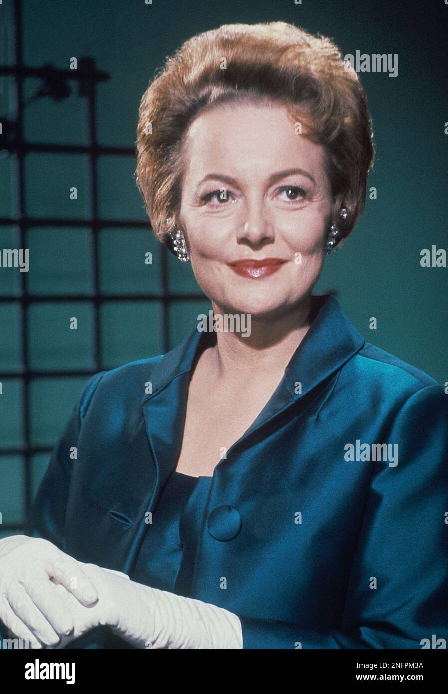 Actress Olivia de Havilland is shown wearing a Christian Dior suit, Feb ...