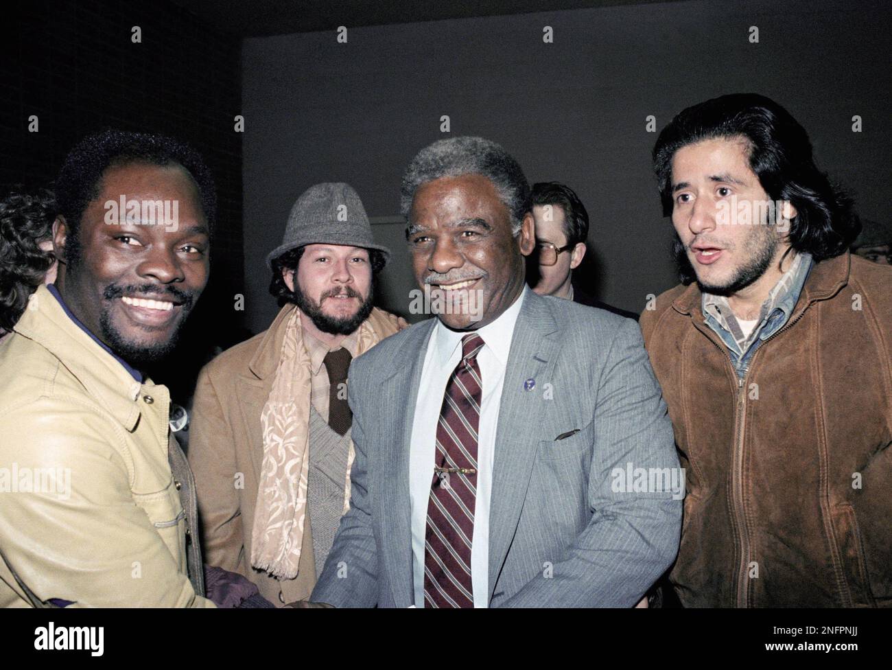 Chicago mayoral candidate Harold Washington is surrounded by supporters ...